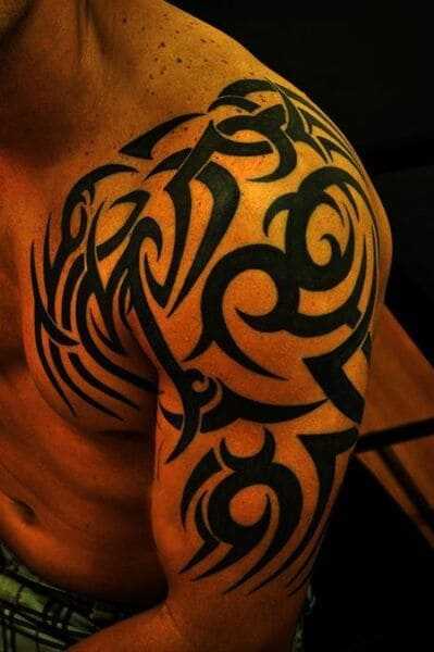 15+ Beautiful & Meaningful Tribal Tattoo Locations - Holistic Ink